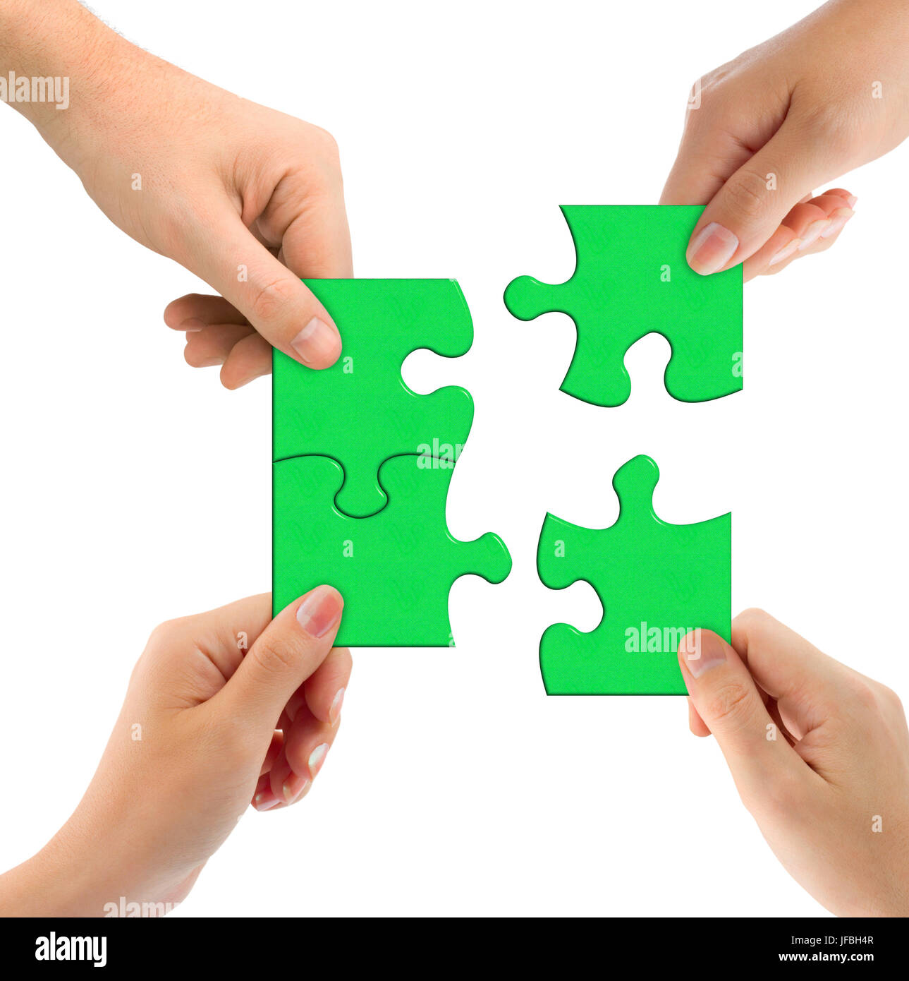 Hands and puzzle Stock Photo - Alamy