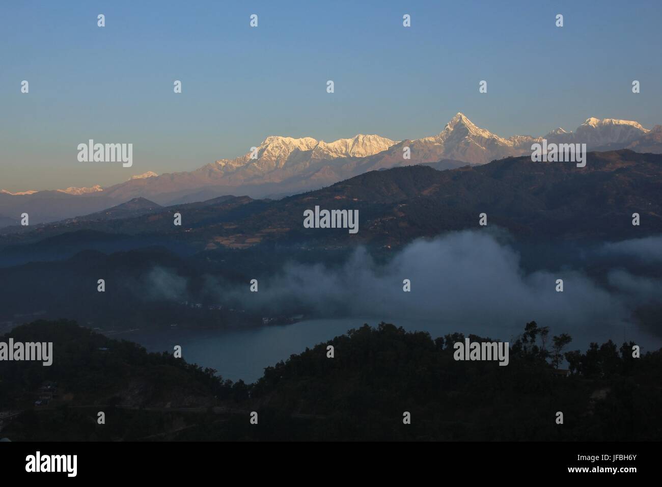 Sunrise at lake Begnas Tal, Annapurna range Stock Photo - Alamy