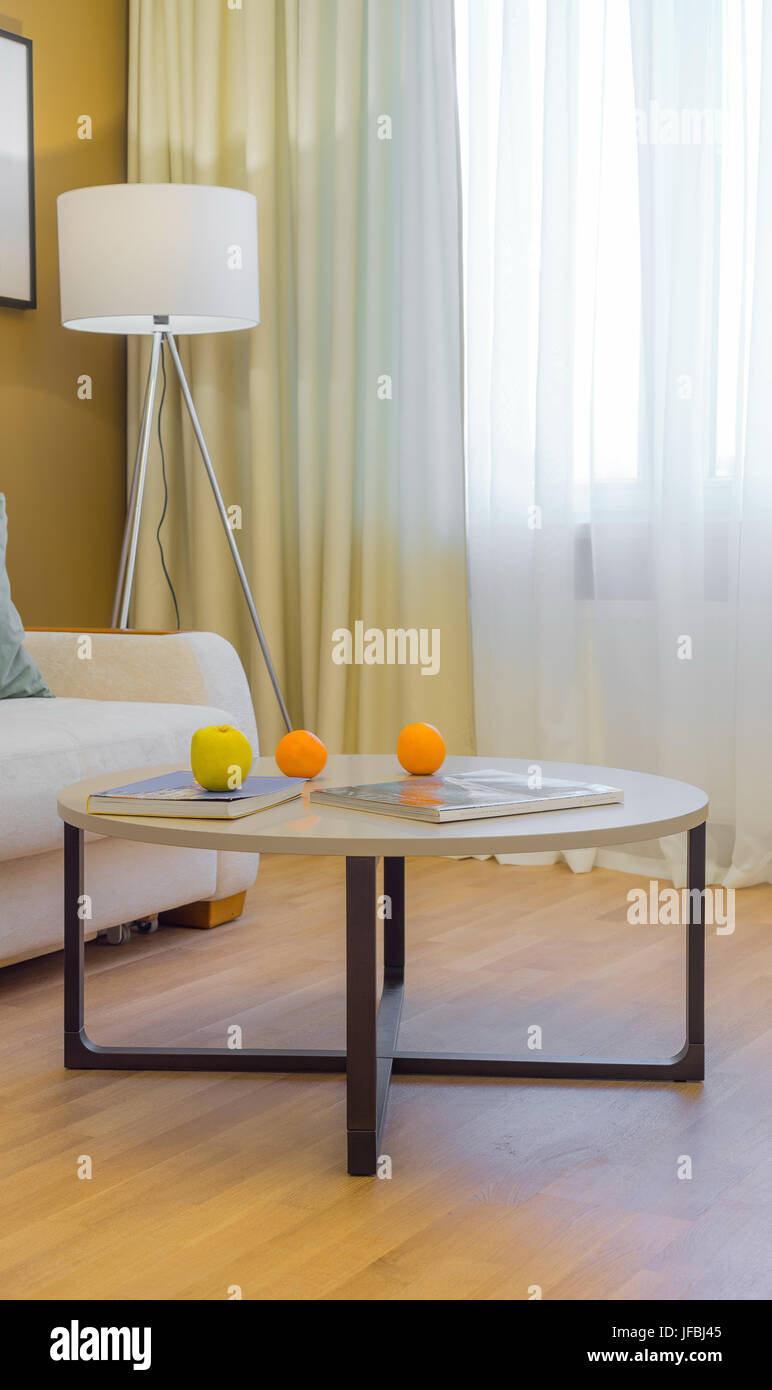 Journal table in the contemporary interior Stock Photo - Alamy