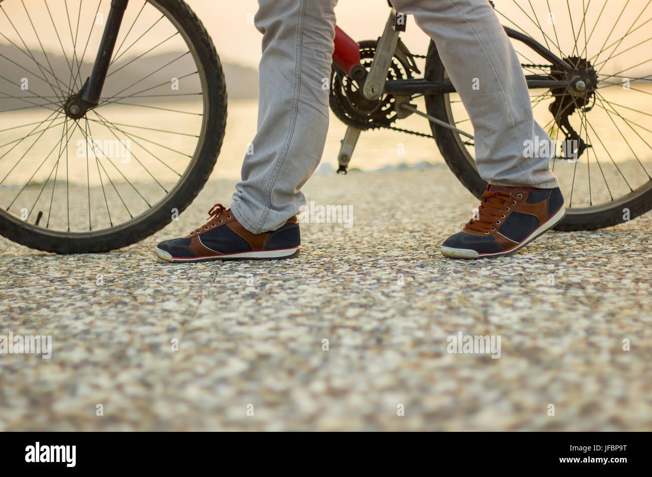 Person with bike still hi-res stock photography and images - Alamy