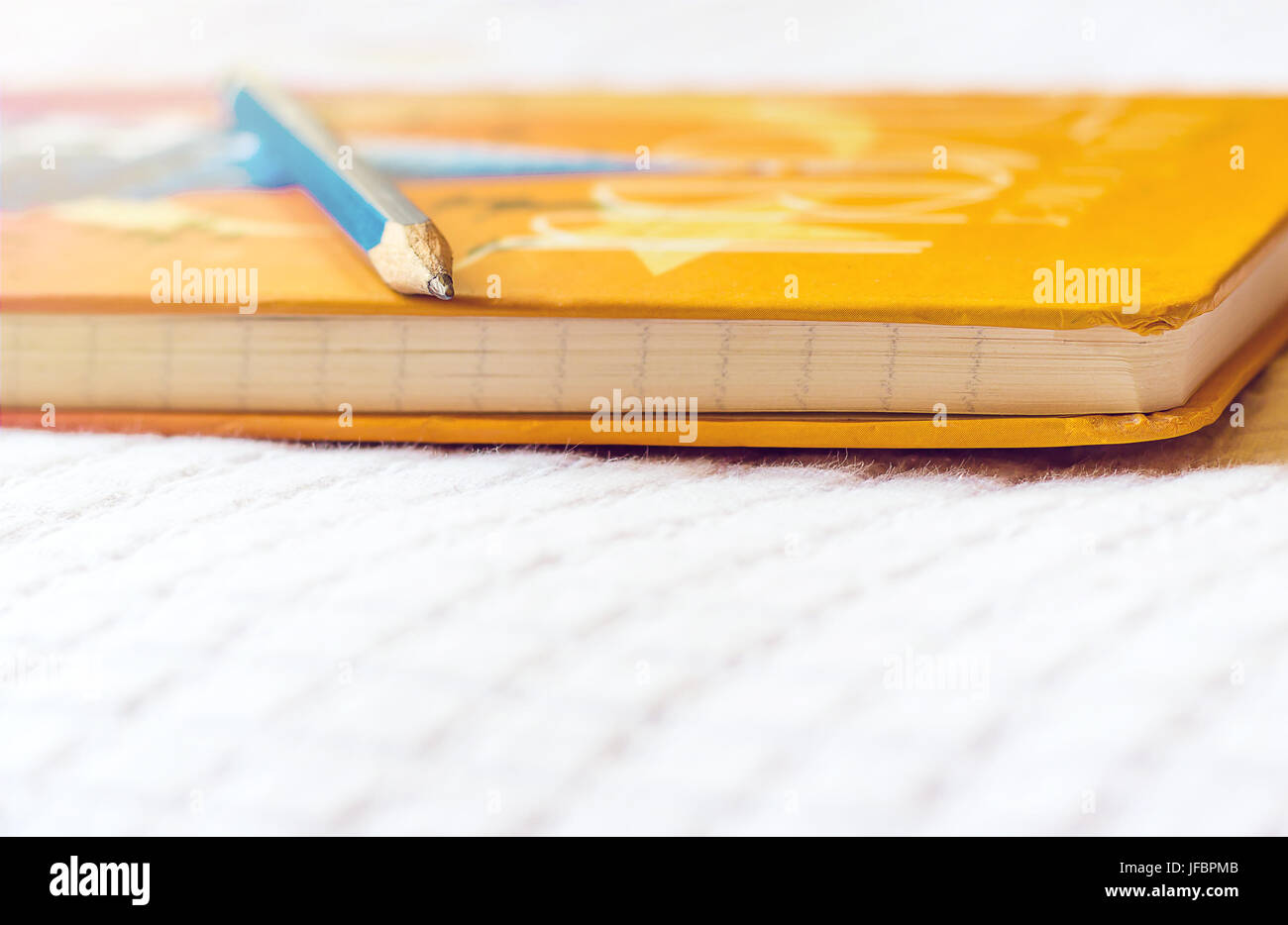 soft and warm colors, books and pencil Stock Photo - Alamy