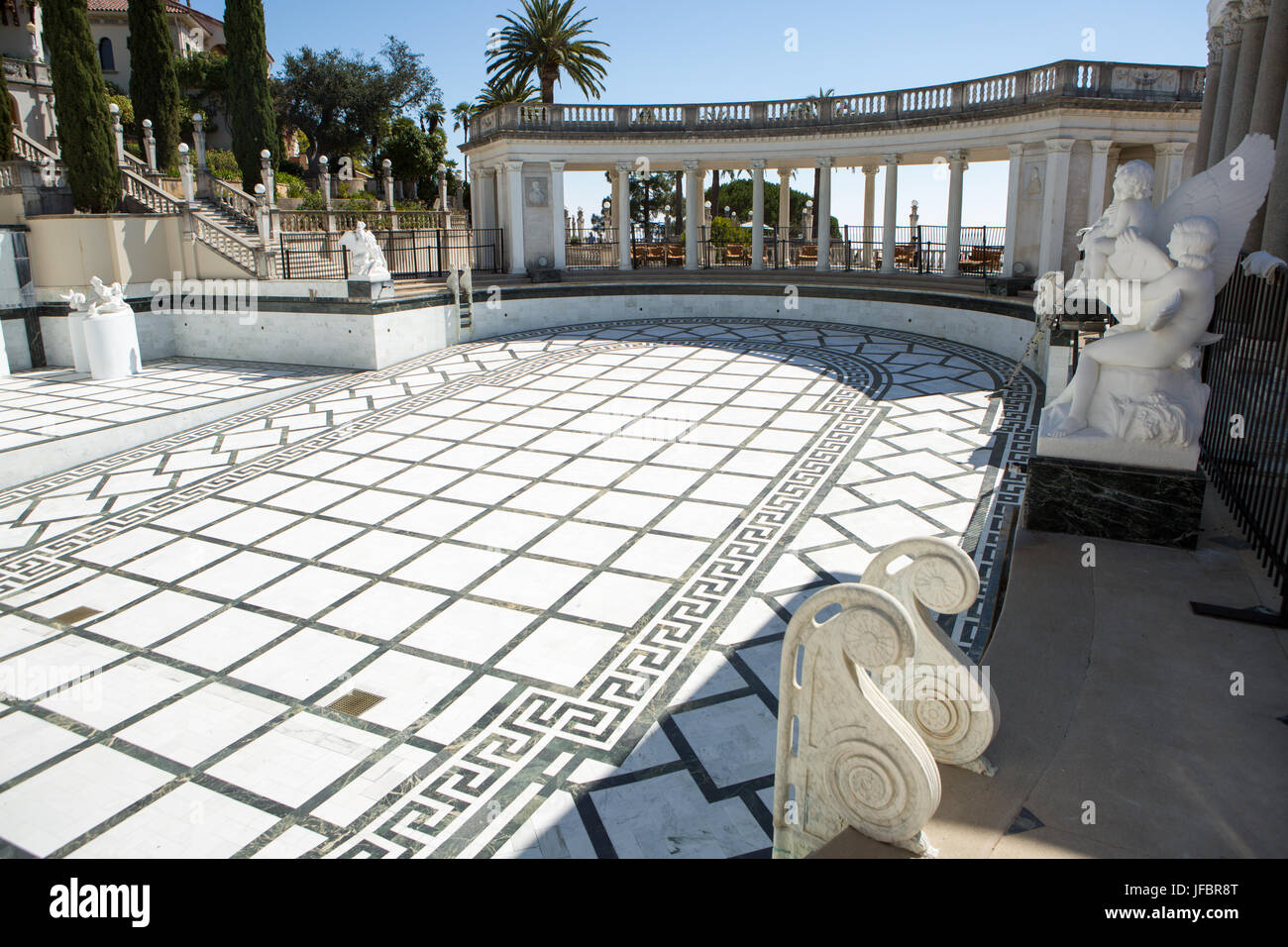 The Neptune Pool at Hearst Castle, empty for restoration, is surrounded ...