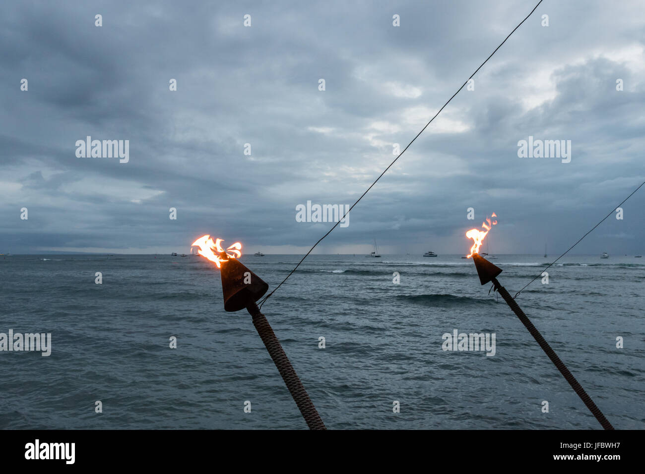 Hawaiian torches at sunset, Lahaina, Maui Stock Photo - Alamy