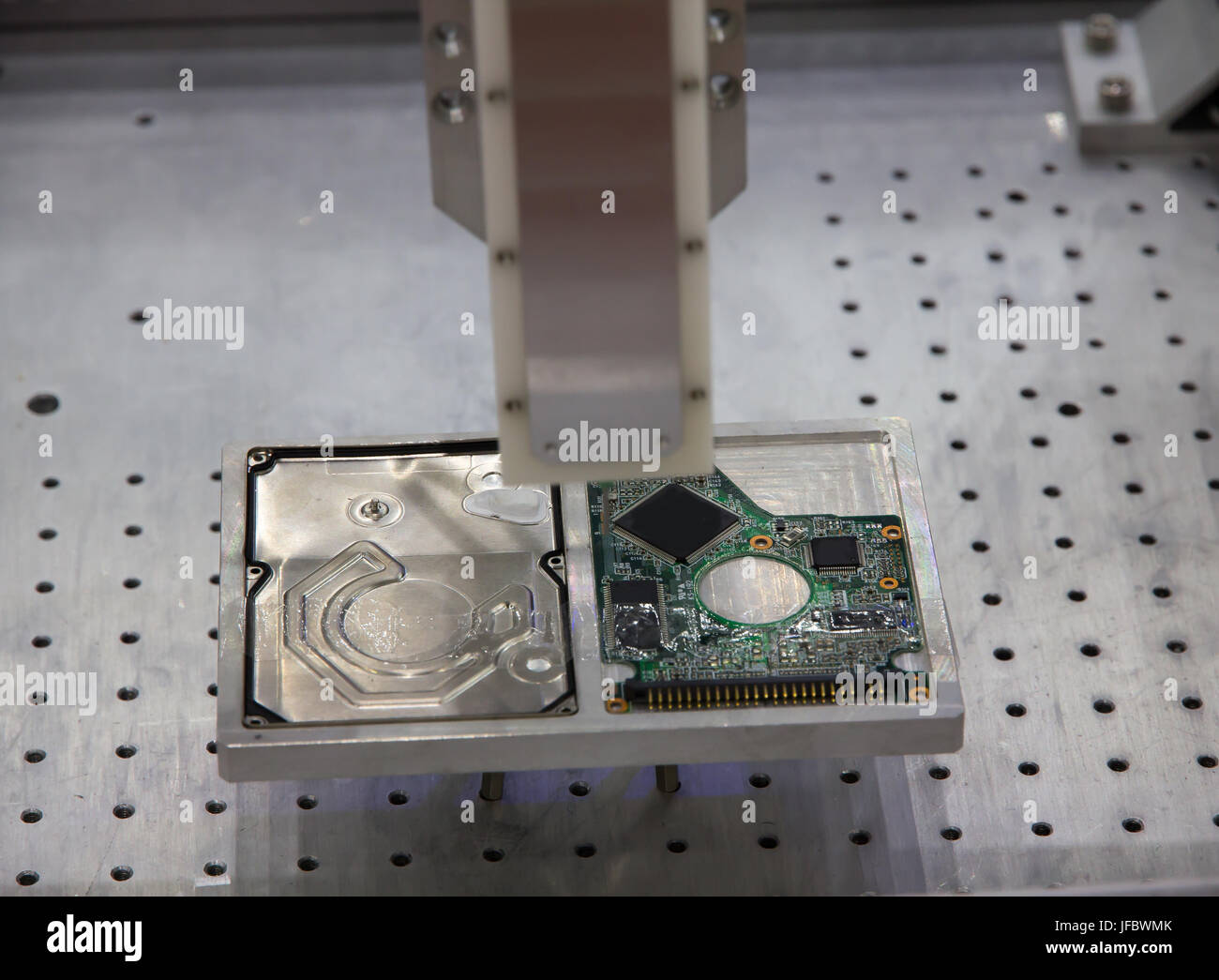 Fully automated hard disk assembly machine Stock Photo - Alamy
