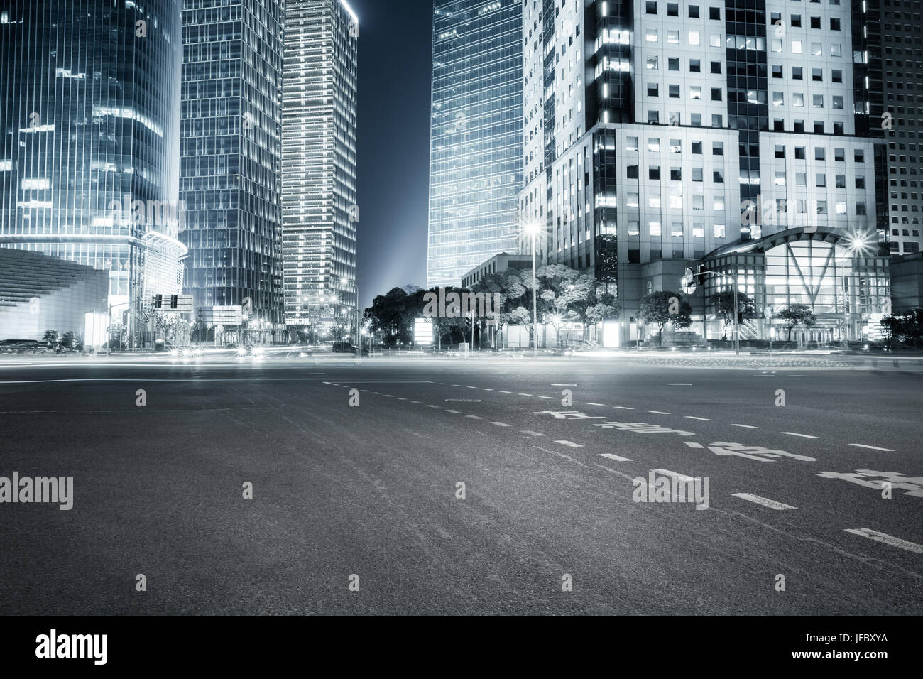 modern buildings at night and road Stock Photo - Alamy