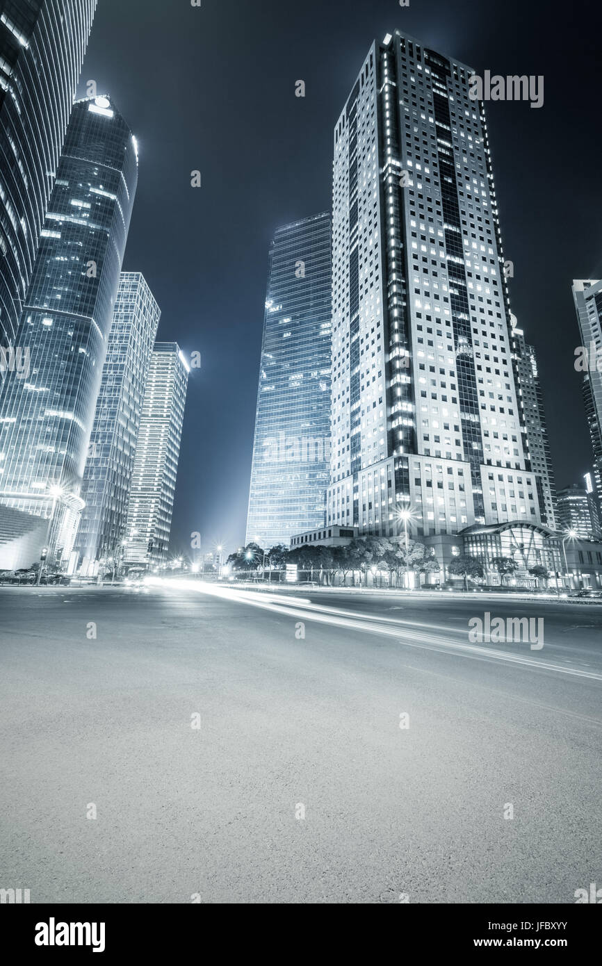 modern buildings at night and road Stock Photo - Alamy