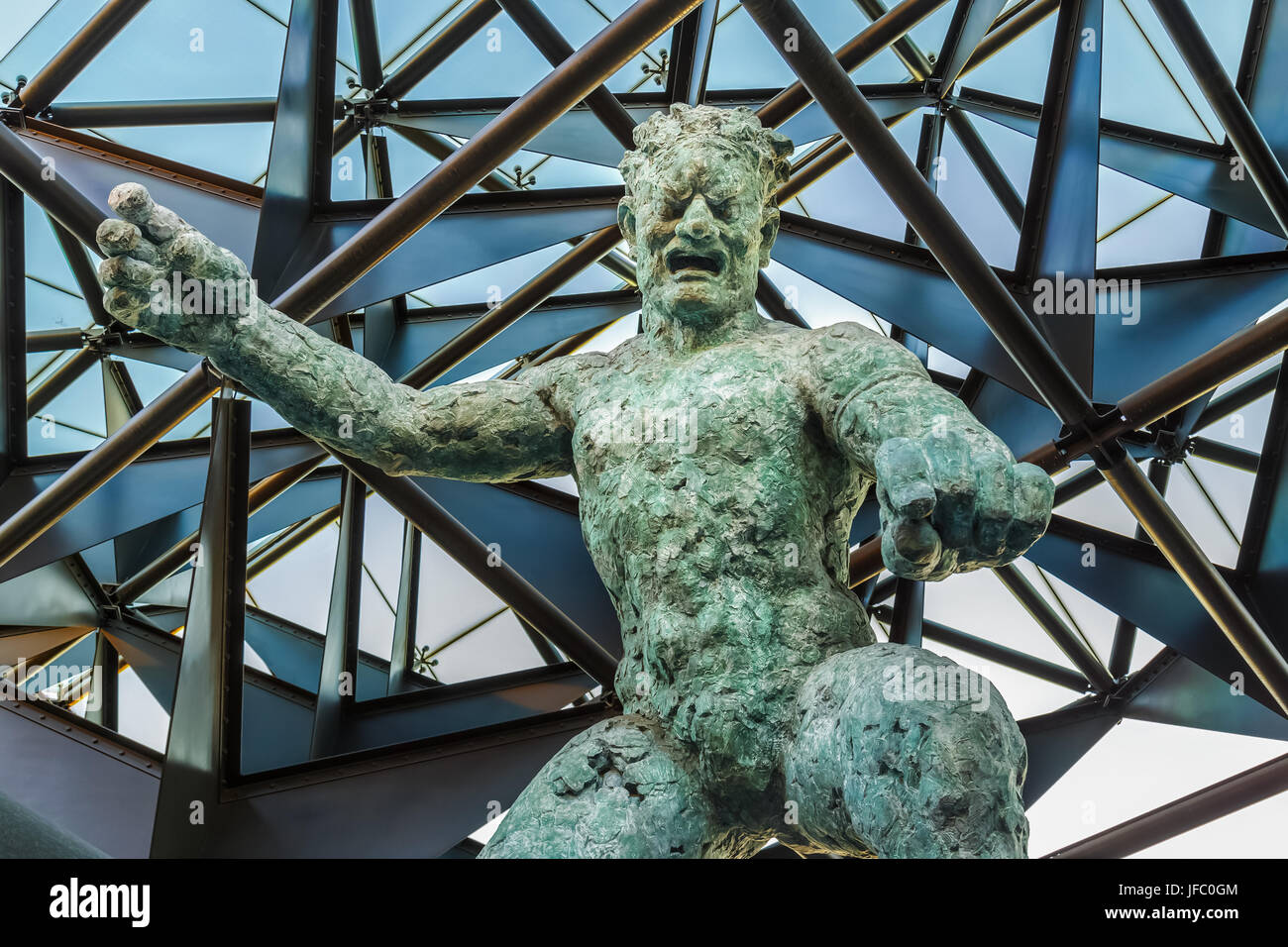 Modern bronze statues of Nio "Benevolent Kings" stand guard at the gate ...