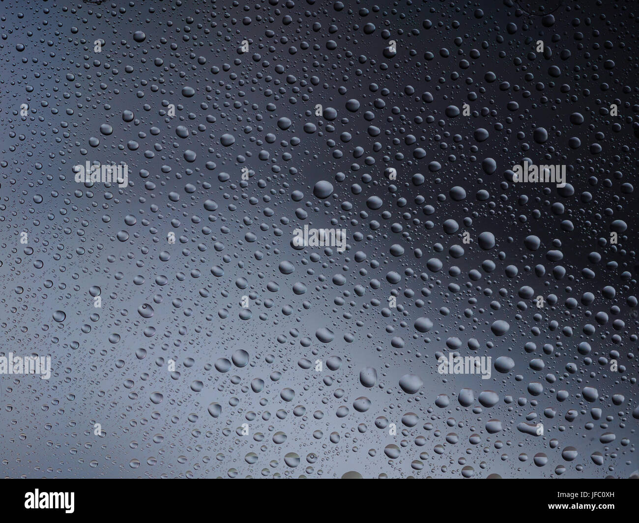 Water drops color background rain glass space rainbow Stock Photo - Alamy