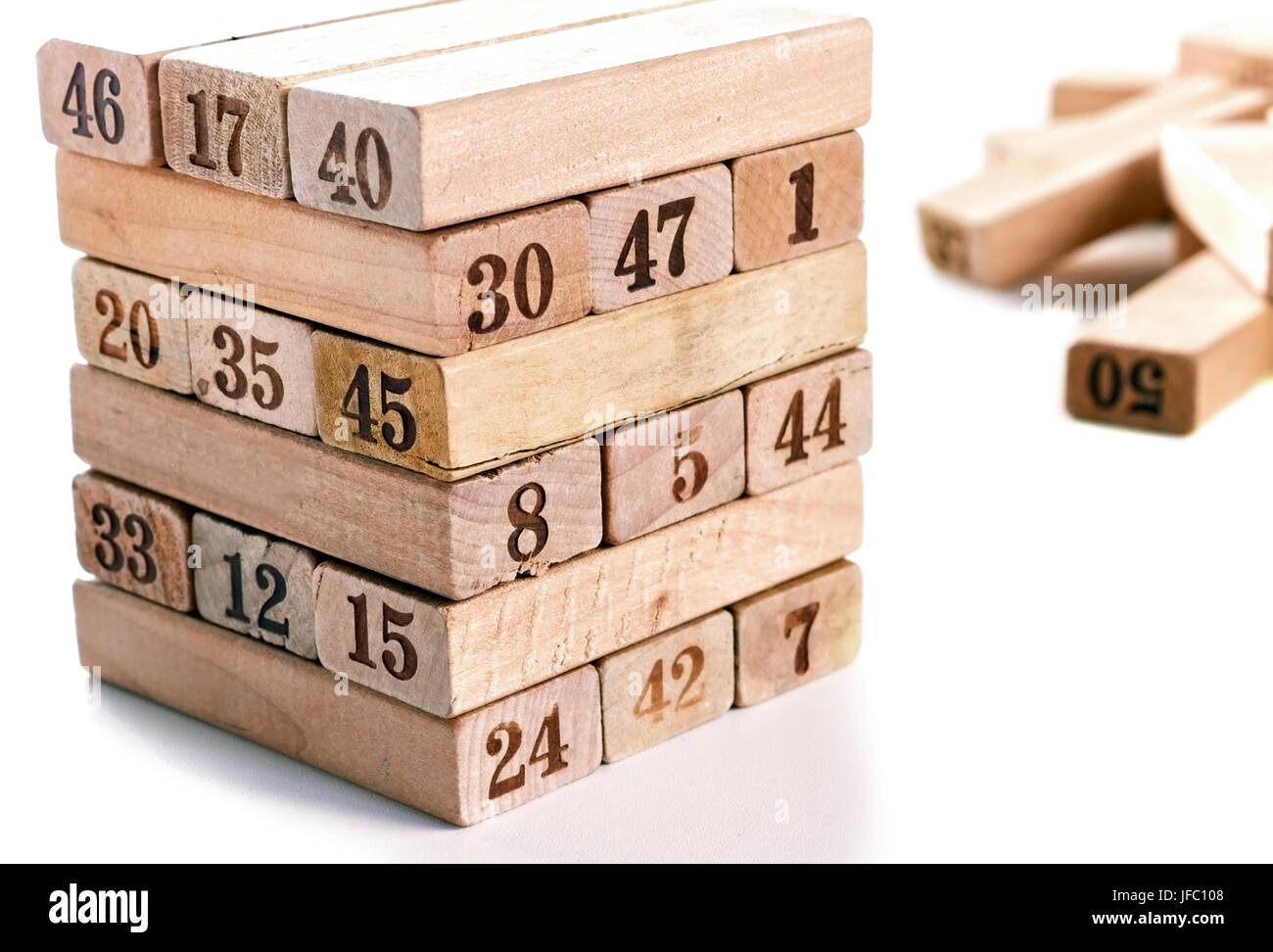 Blocks of game isolated on white background. Vertical tower whole and ...