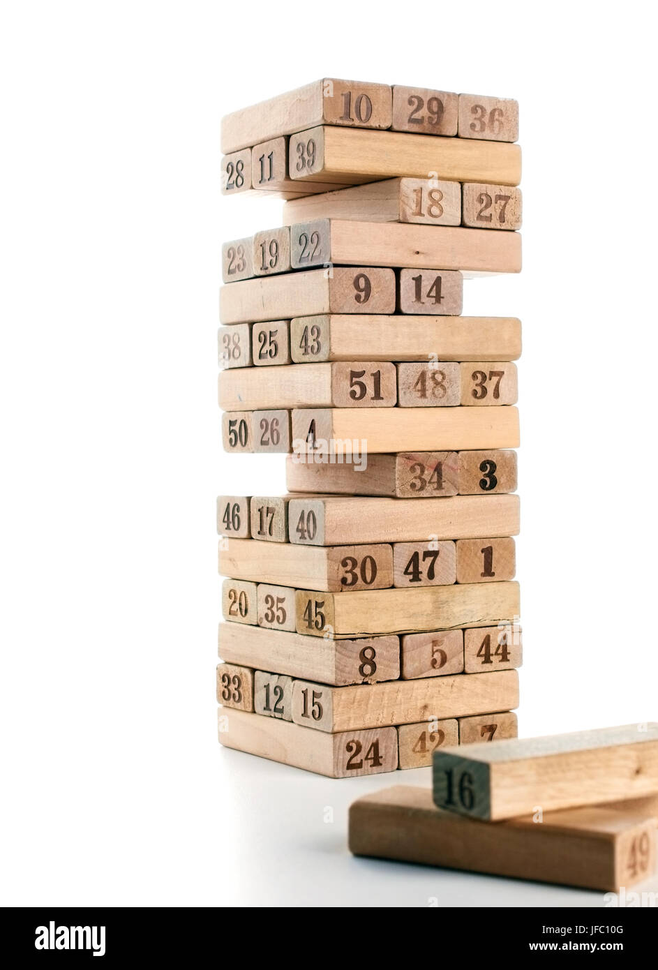 Blocks of game isolated on white background. Vertical tower whole and ...