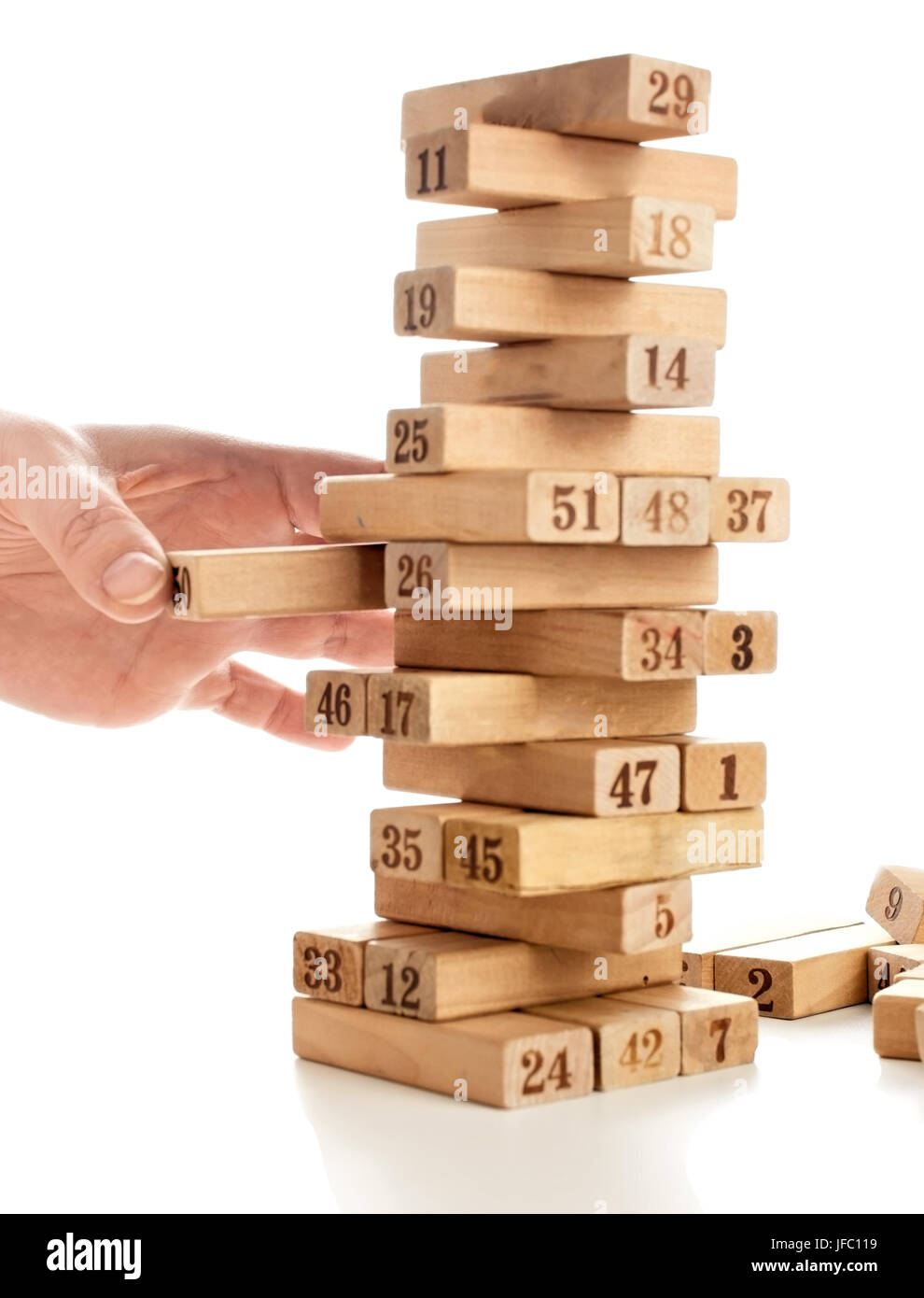 Blocks of game isolated on white background. Vertical tower whole and ...