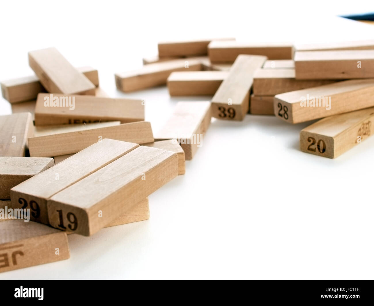 Blocks of game isolated on white background. Vertical tower whole and ...