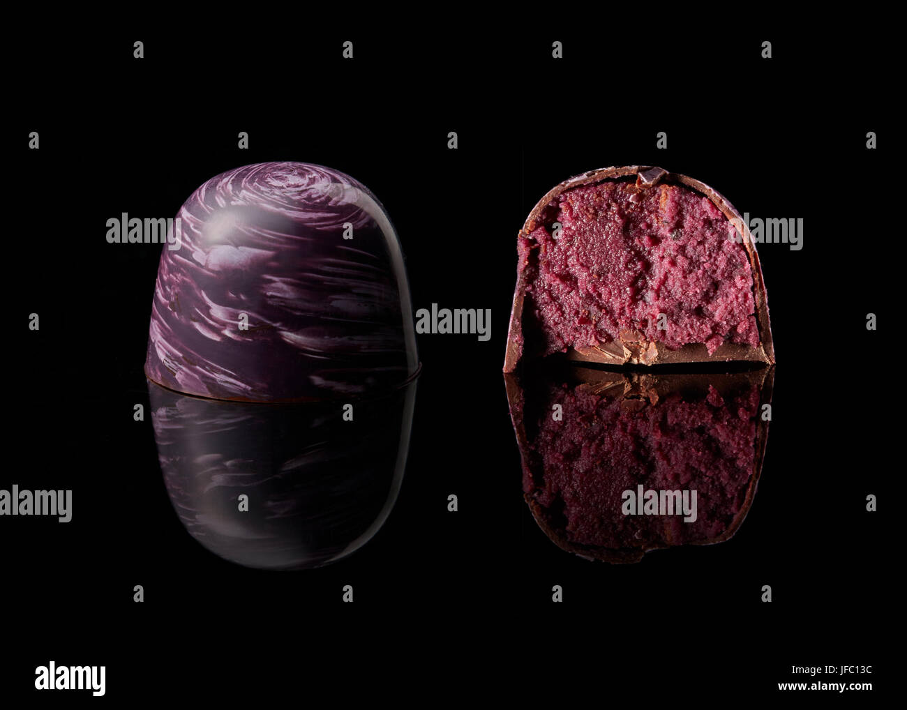 chocolate candy on black background Stock Photo - Alamy