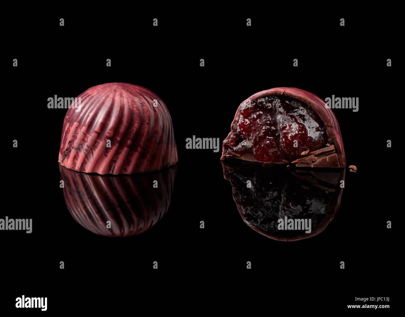 chocolate candy on black background Stock Photo - Alamy