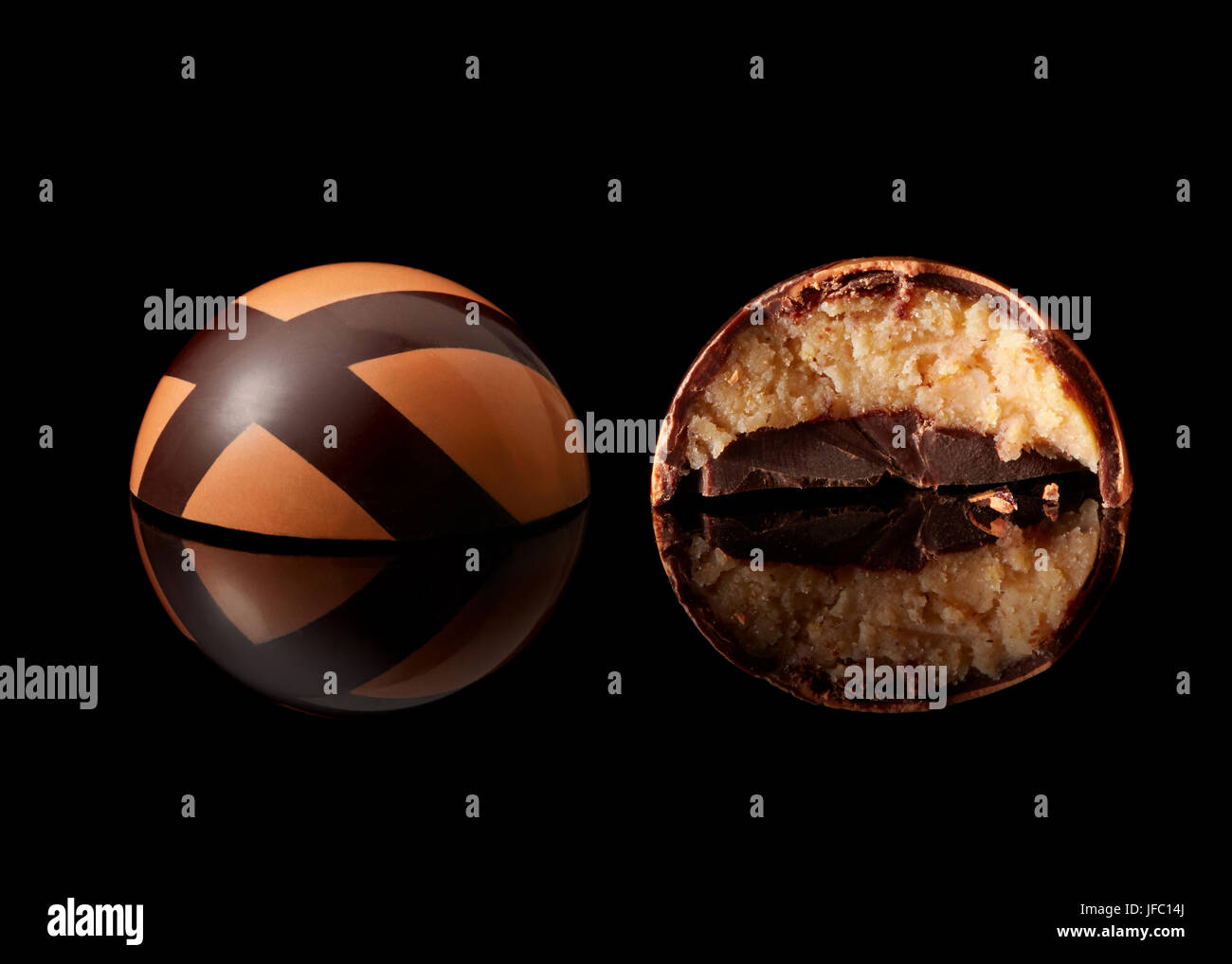 chocolate candy on black background Stock Photo - Alamy