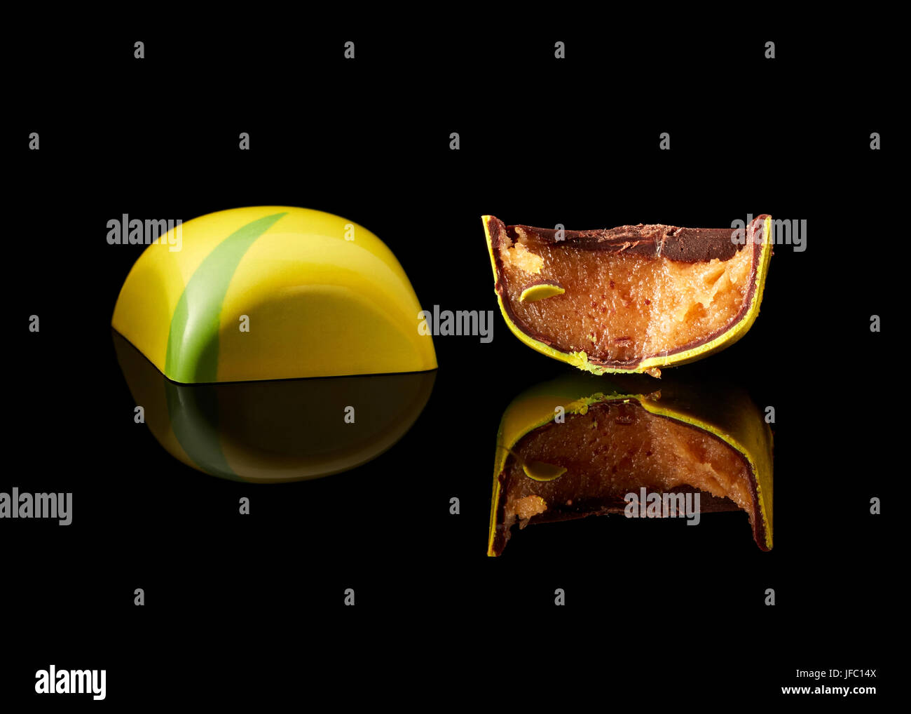 chocolate candy on black background Stock Photo - Alamy
