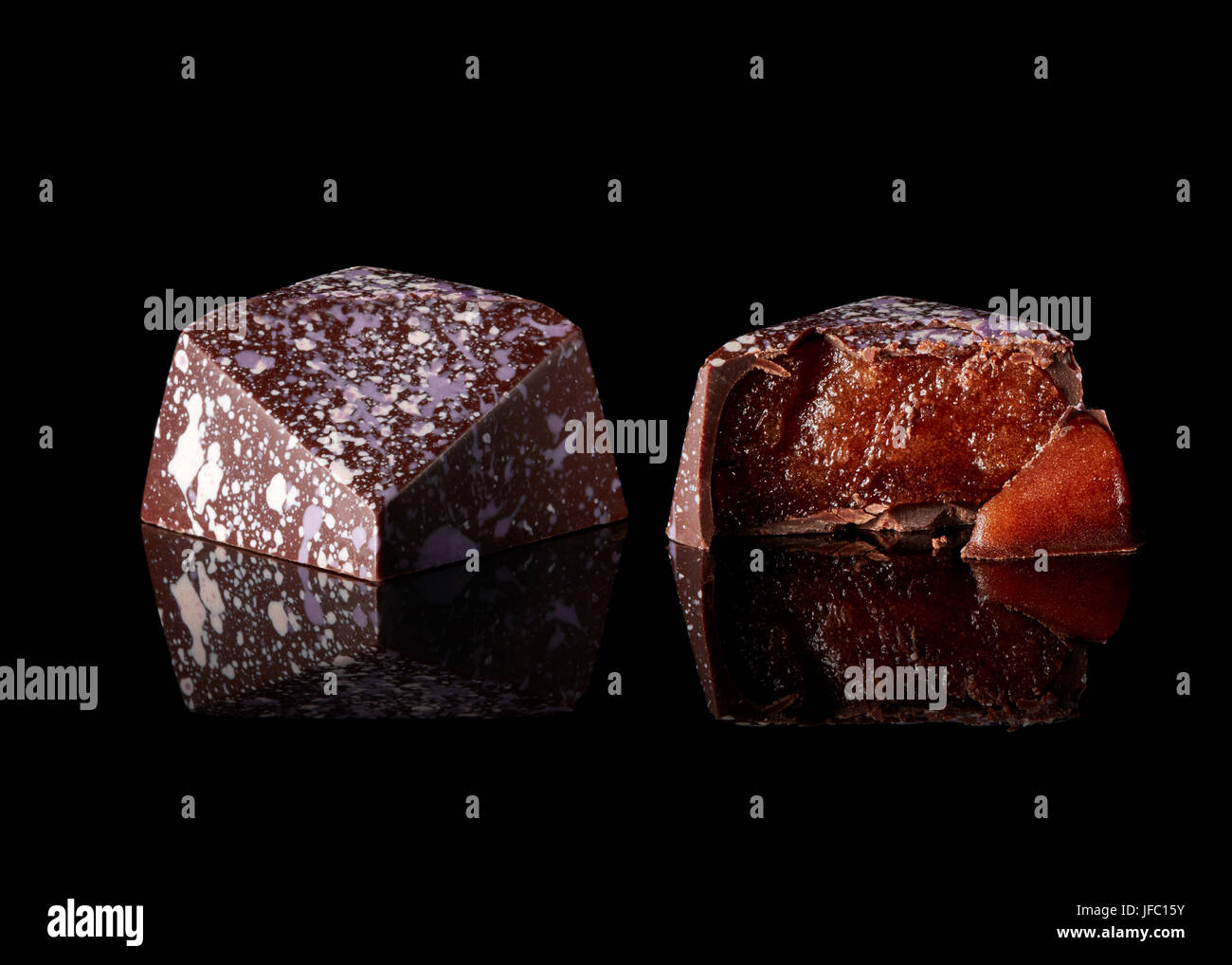 chocolate candy on black background Stock Photo - Alamy