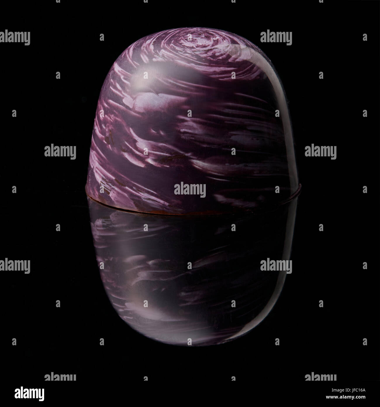 chocolate candy on black background Stock Photo - Alamy
