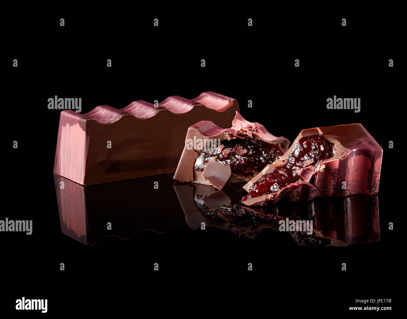 chocolate candy on black background Stock Photo - Alamy
