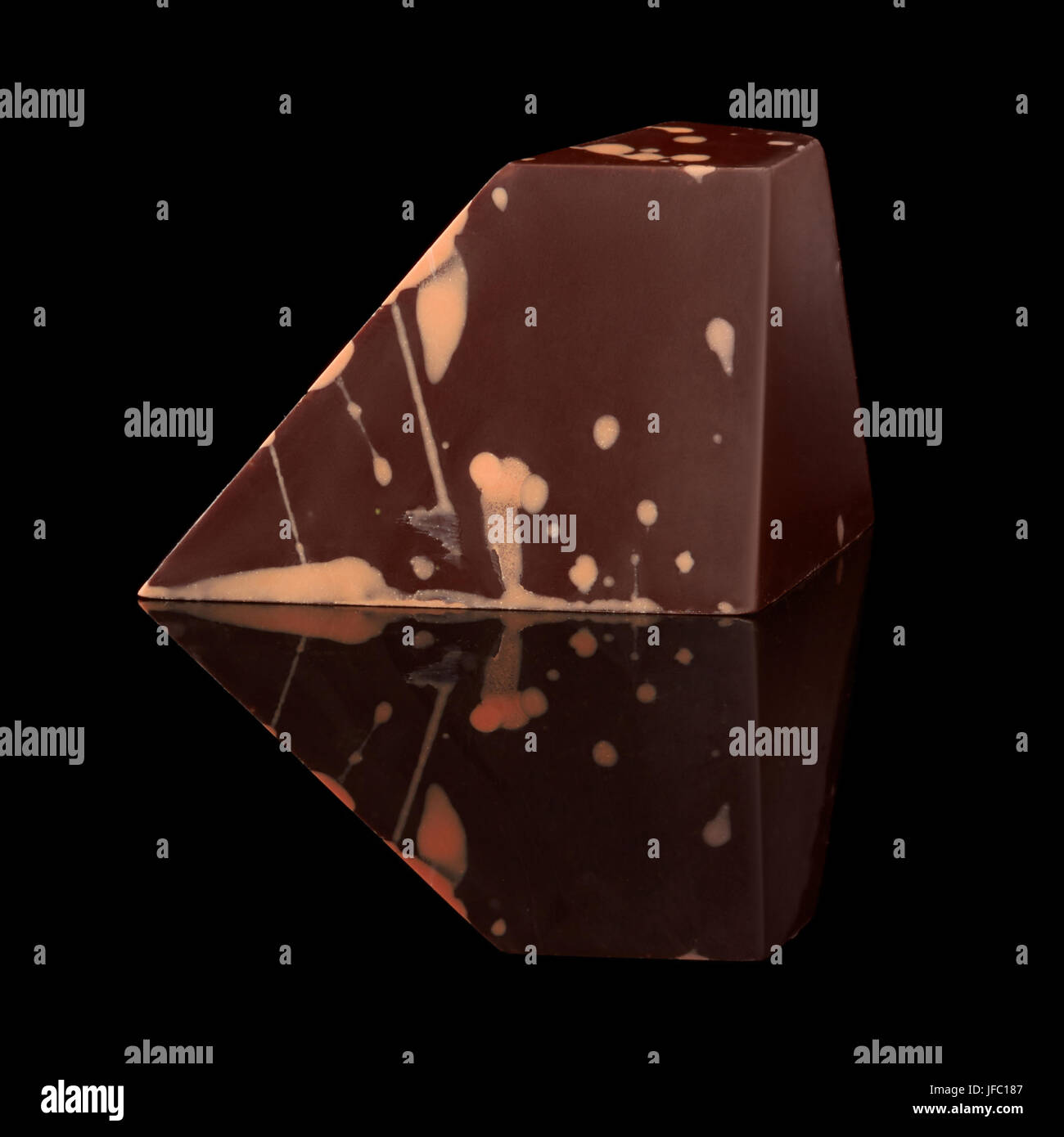 chocolate candy on black background Stock Photo - Alamy