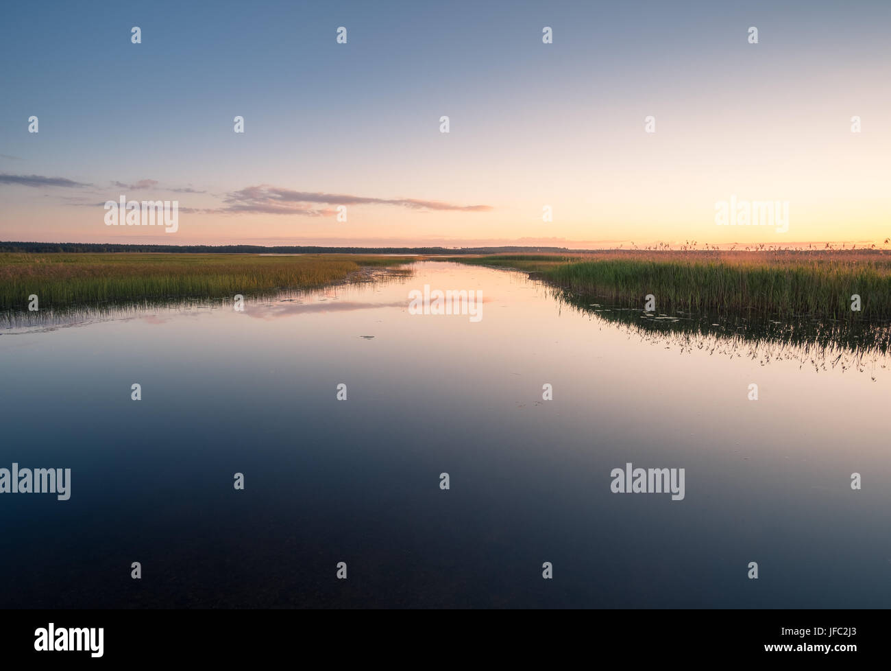 Scenic lake view with peaceful water surface in Finland Stock Photo - Alamy