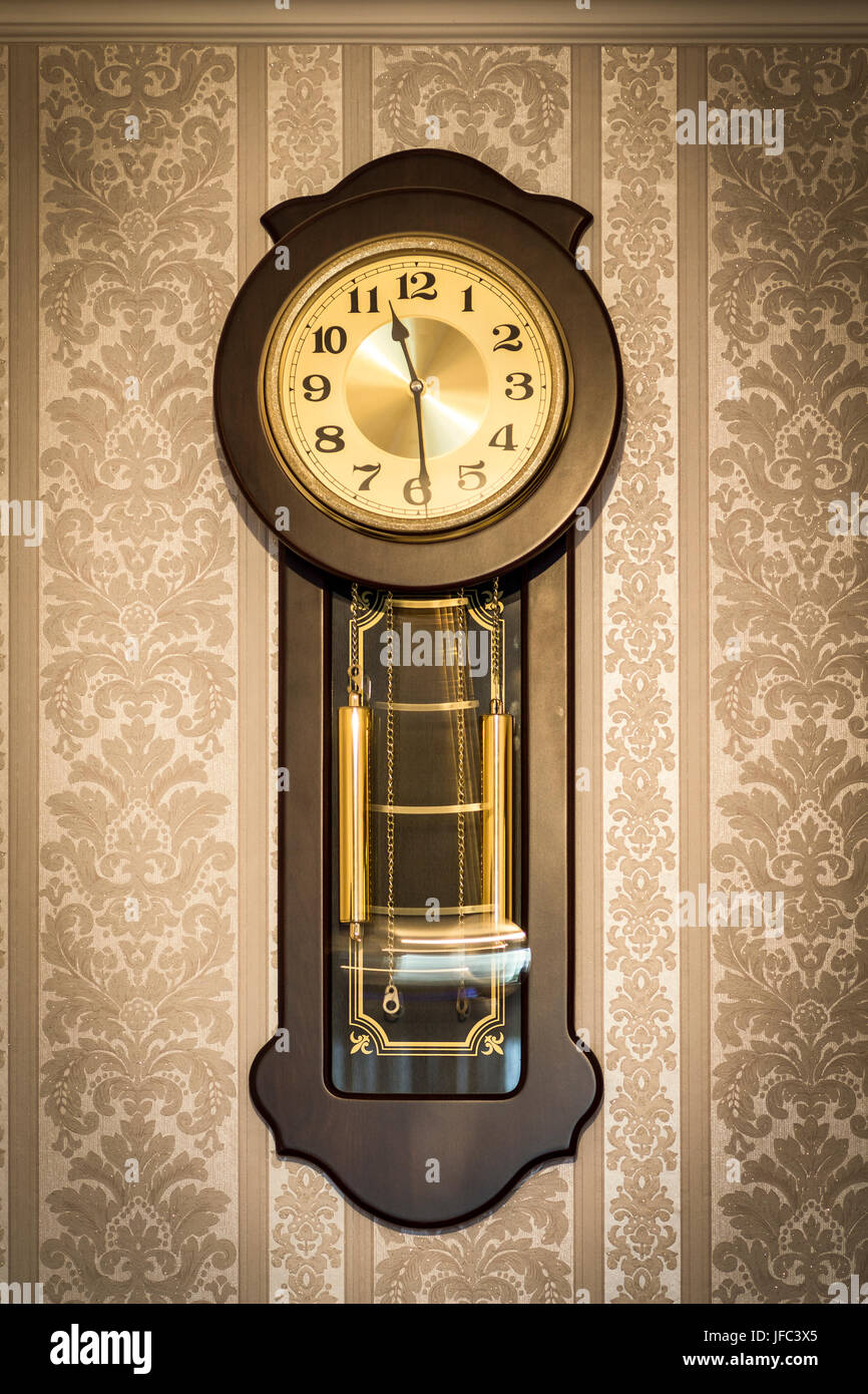 Pendulum clock oscillation hi-res stock photography and images - Alamy