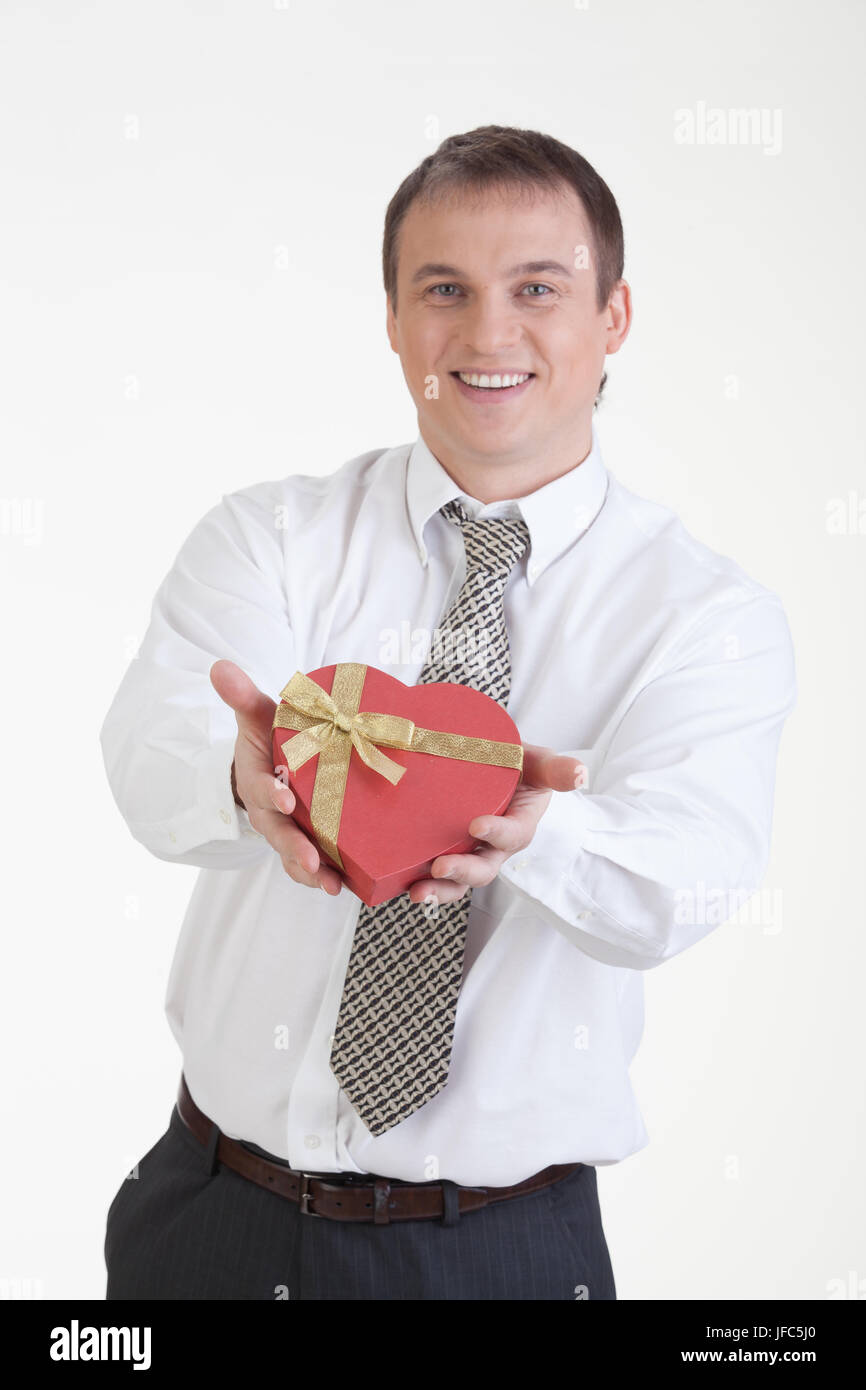 Young Man With A Gift Stock Photo - Alamy