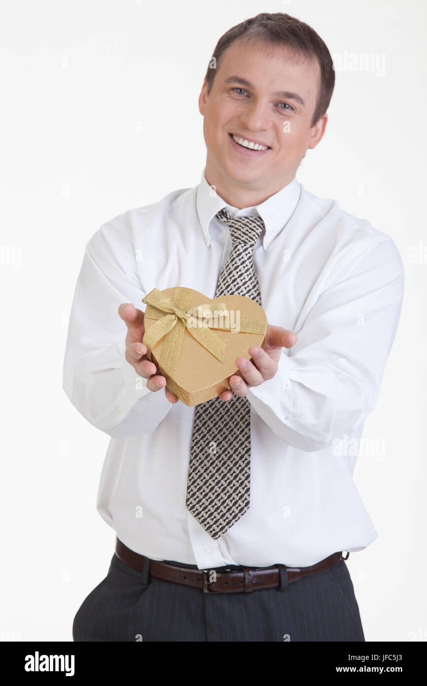 Young Man With A Gift Stock Photo - Alamy