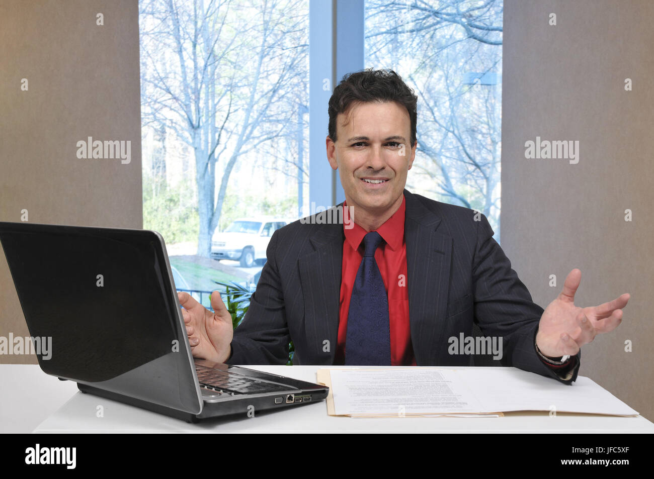 Salesman at a computer Stock Photo - Alamy