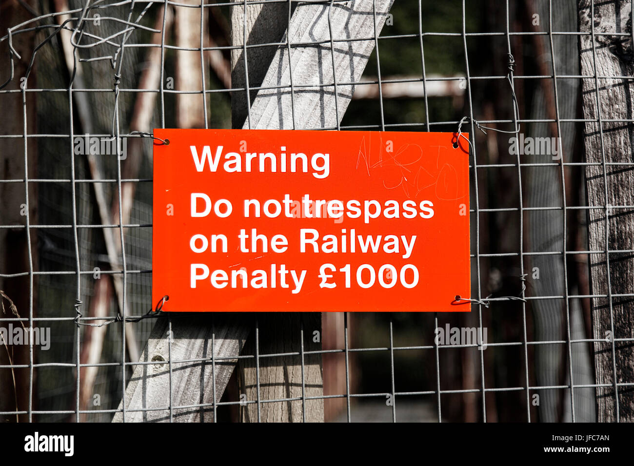 Warning trespass on railway sign hi-res stock photography and images ...