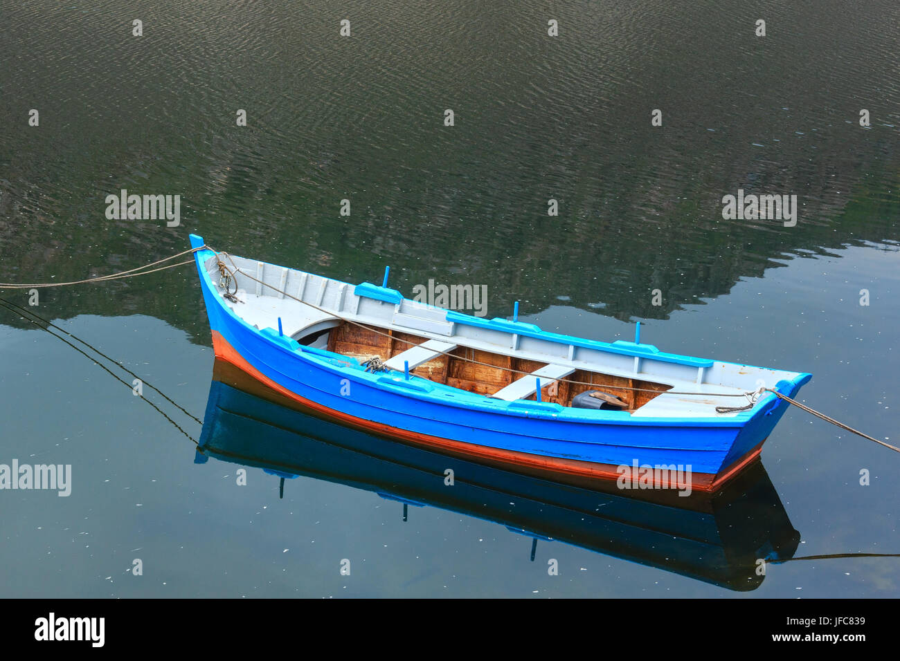 Boat on lake water surface Stock Photo - Alamy