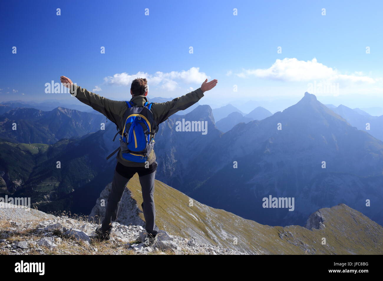 Happy man hiker arms hi-res stock photography and images - Alamy
