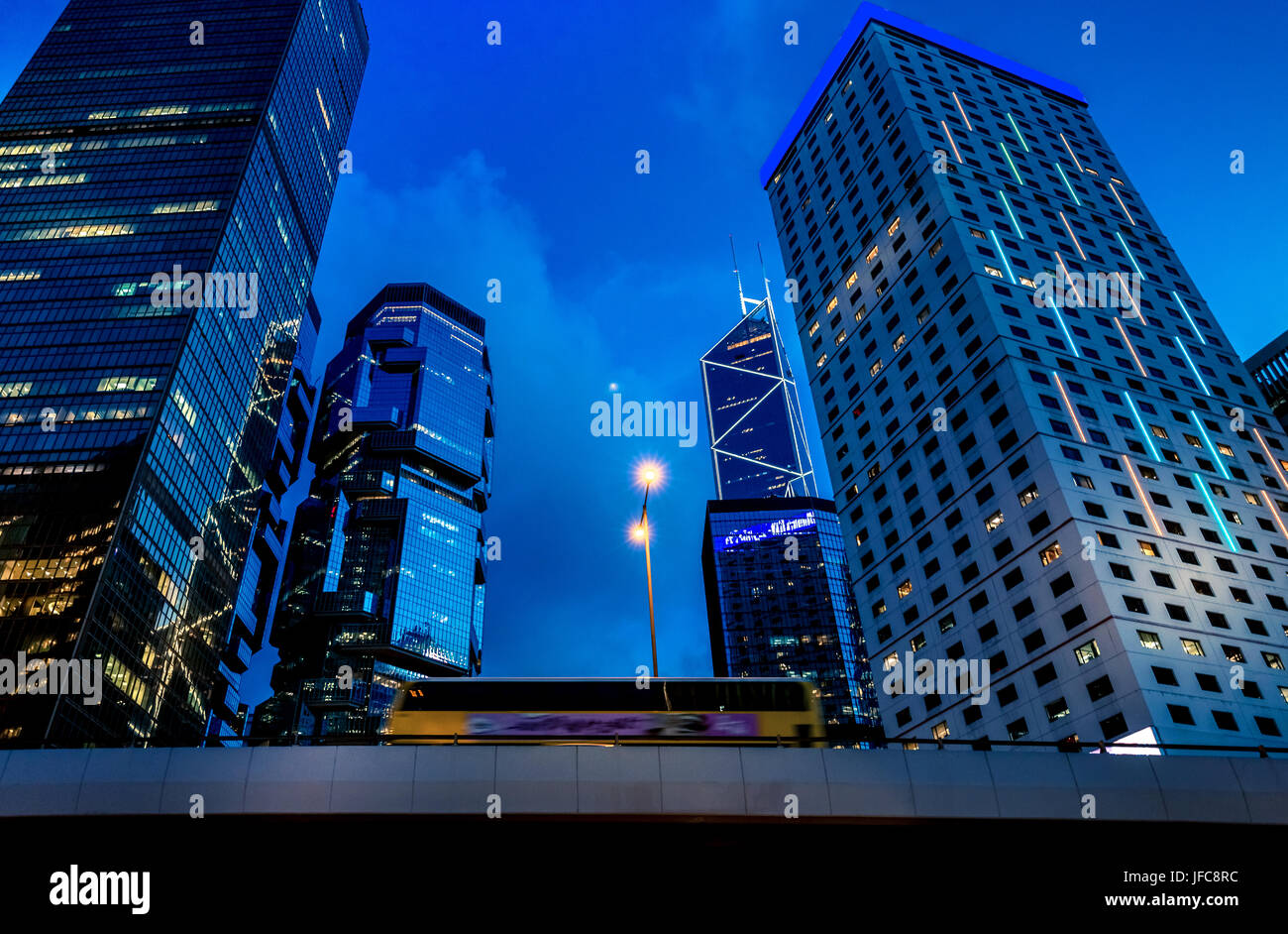 Commercial buildings at night in Hong Kong Stock Photo - Alamy