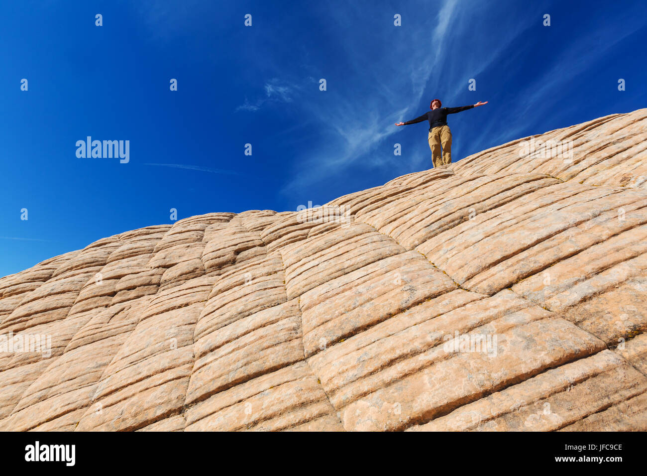 Man on the cliff Stock Photo - Alamy