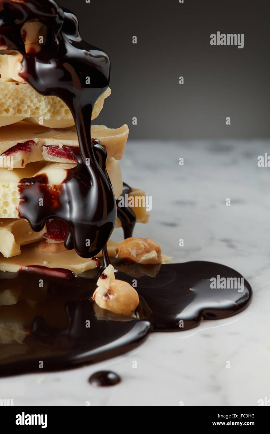 syrop pouring onto a piece of chocolate Stock Photo - Alamy