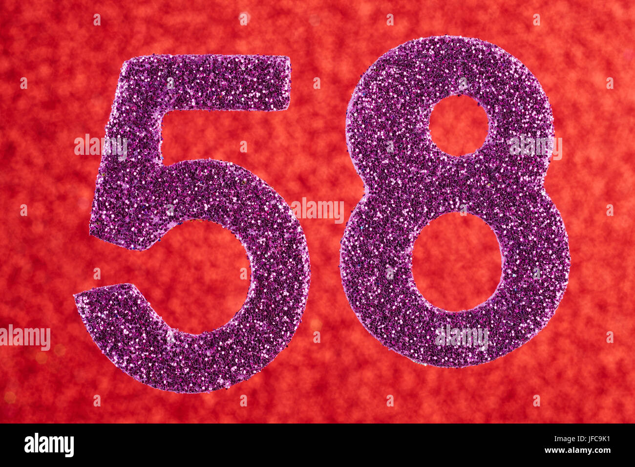 Number fifty-eight purple color over a red background. Anniversary ...
