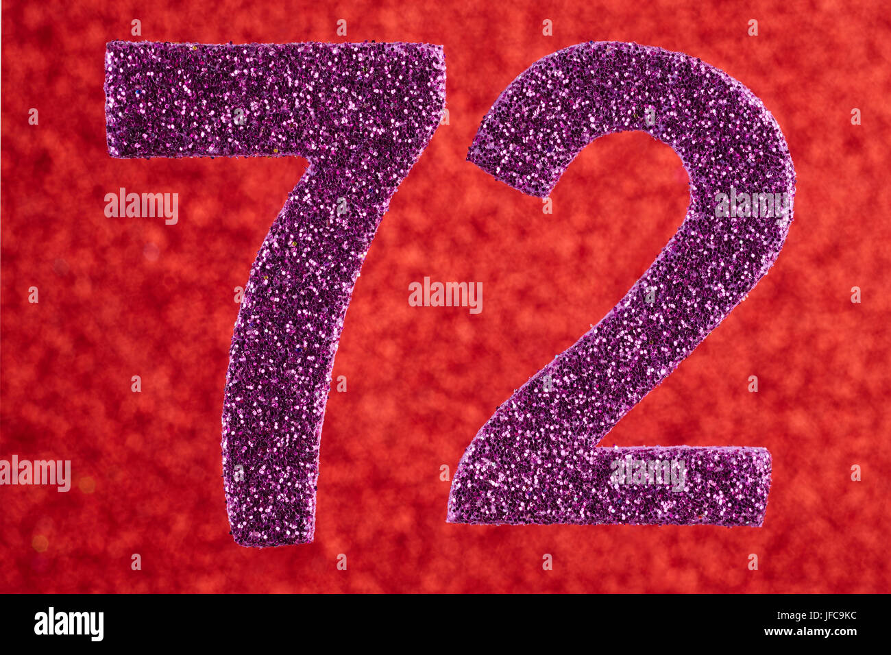 Number seventy-two purple color over a red background. Anniversary ...