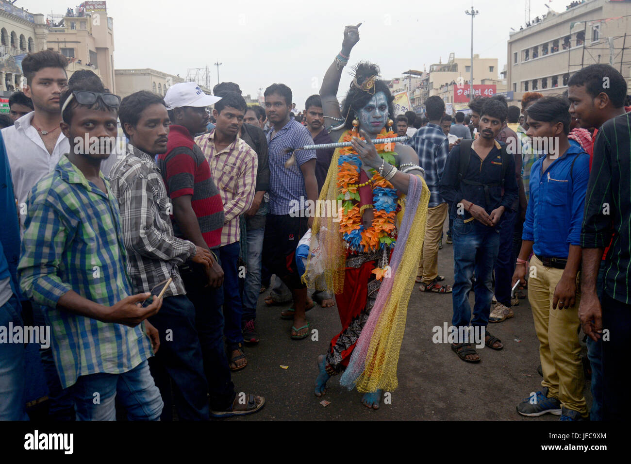 Hindu man in Lord Krishna attire joins the Ratha Yatra or Car Festival ...