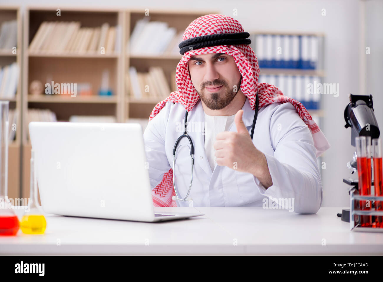 Arab doctor working in the lab hospital Stock Photo - Alamy