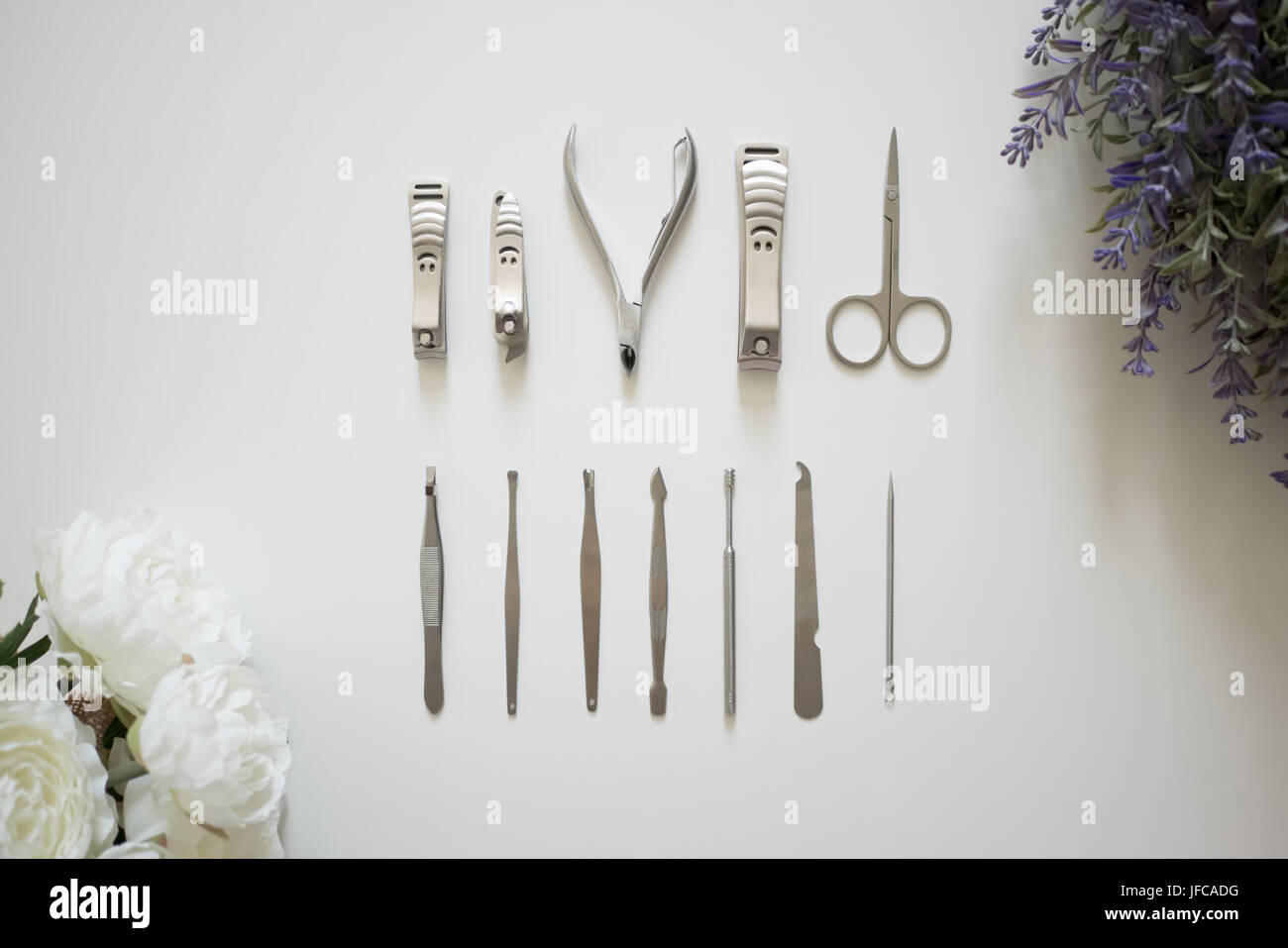 manicure instruments set on white background top view Stock Photo - Alamy