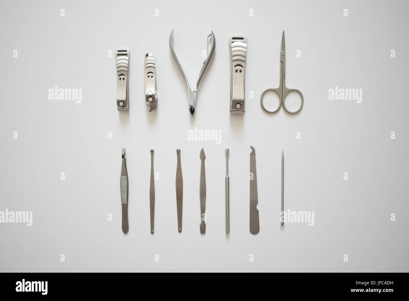 manicure instruments set on white background top view Stock Photo - Alamy