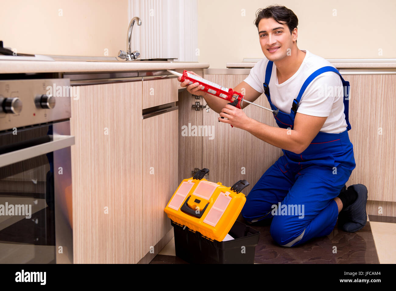 Kitchen sink sealing hi-res stock photography and images - Alamy