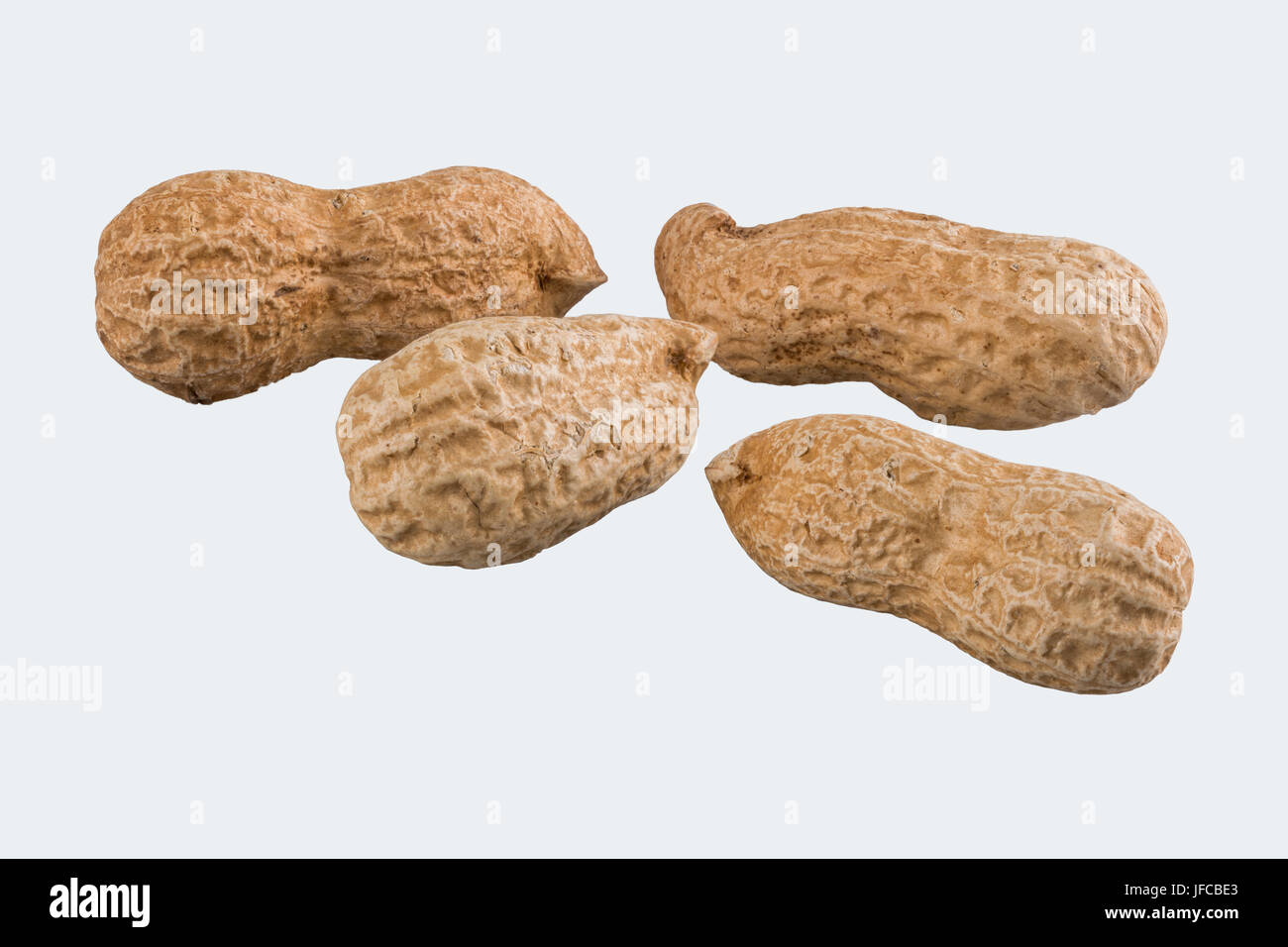 Groundnuts on a white background Stock Photo - Alamy