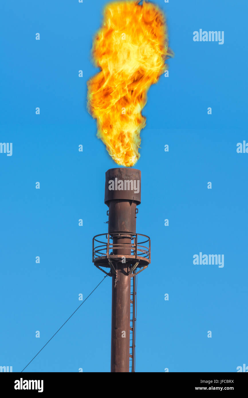 Chimney for flaring Stock Photo - Alamy