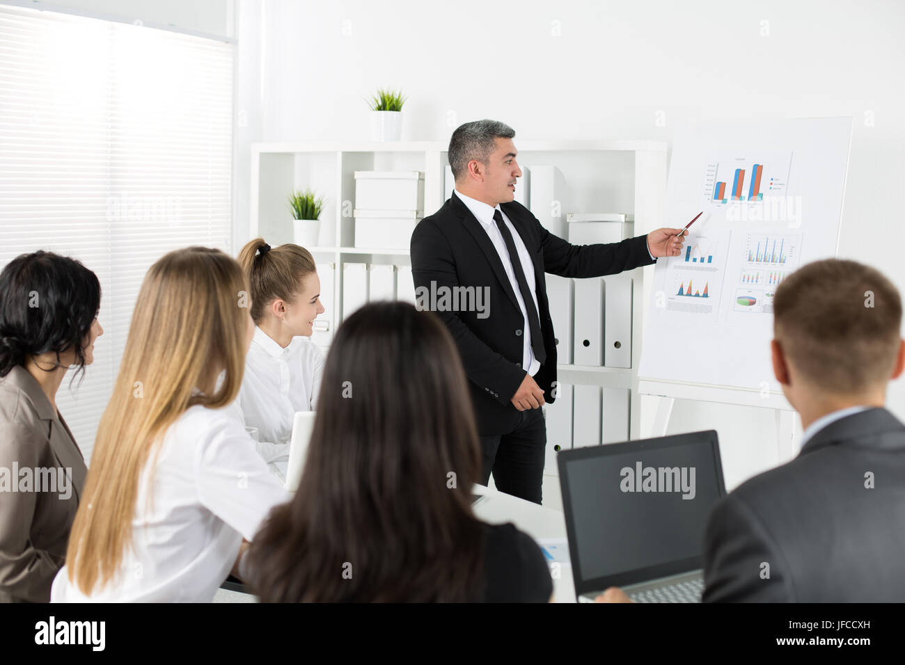 Business people meeting in office to discuss project. Business success ...