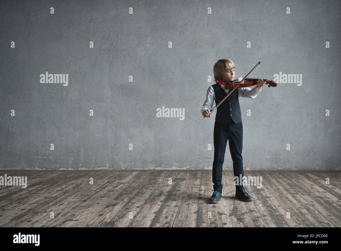 Child musician hi-res stock photography and images - Alamy