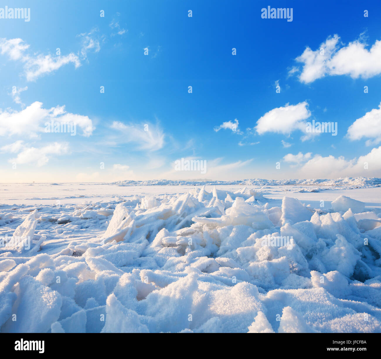 snow hill and blue sky Stock Photo - Alamy
