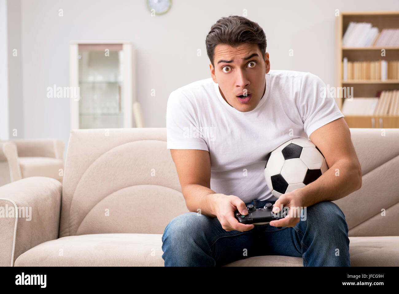 Man addicted to computer games Stock Photo - Alamy