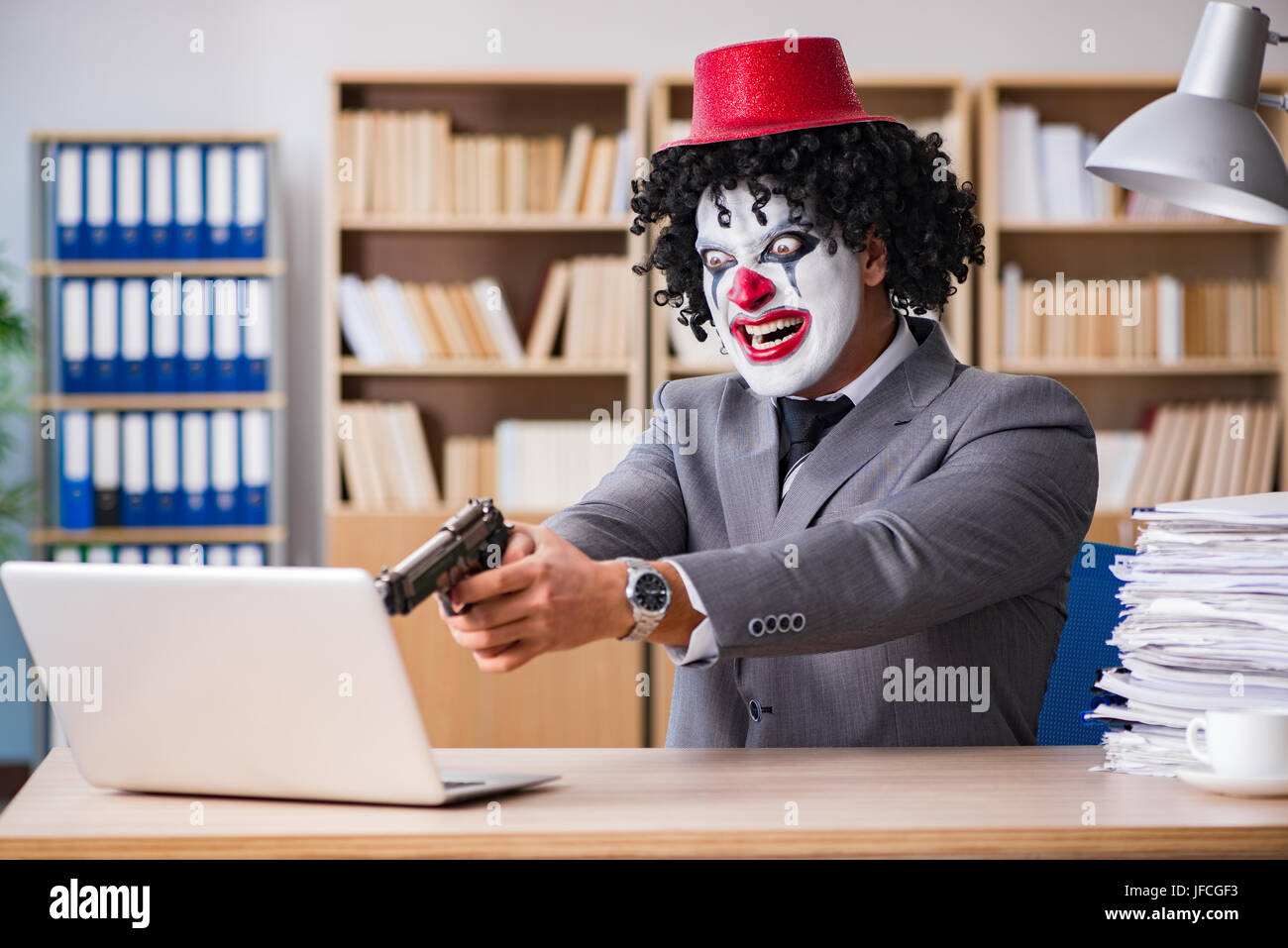 Clown businessman working in the office Stock Photo - Alamy