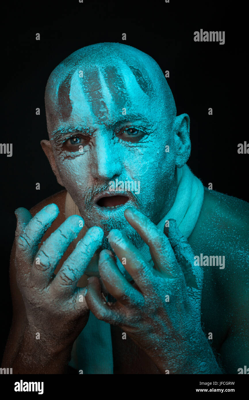 Portrait of frozen man. He is bald and scary Stock Photo - Alamy